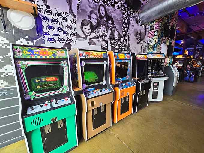 Rows of classic arcade cabinets stand ready like old friends waiting to reconnect after too many years apart.