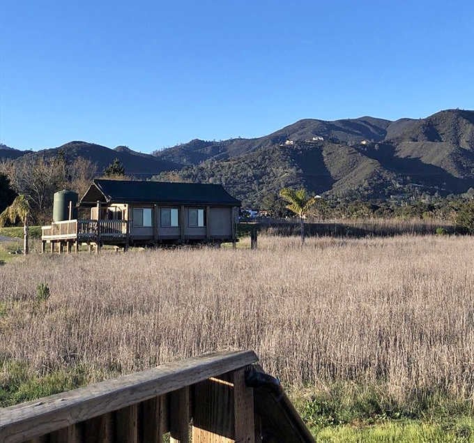 Wake up to mountain views and grazing fields that somehow make perfect sense as an elephant's California retirement community backdrop.