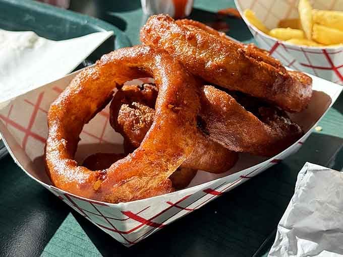 Onion rings so perfectly crispy they could be used as edible jewelry at fancy dinner parties.