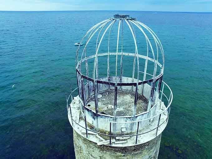 The lantern room still stands, though the light inside went dark over a century ago and won't be coming back.