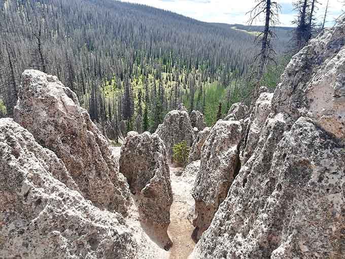 Volcanic tuff pillars rise like ancient sentinels, guarding secrets that took millions of years to carve into existence.
