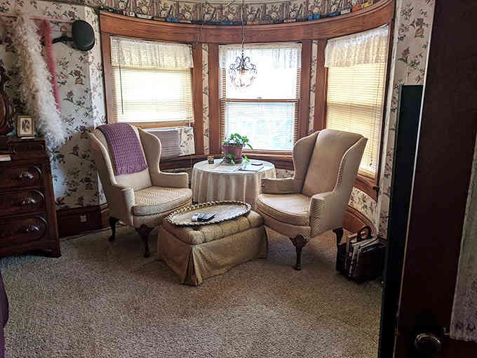 This sitting area with its wingback chairs offers the perfect spot for morning coffee or evening contemplation.