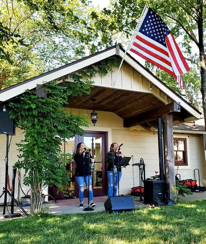 Live music under the trees, because good wine deserves a soundtrack that isn't car horns.