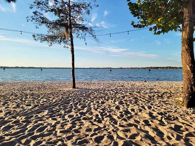 Evening light casting long shadows across pristine sand makes you want to kick off your shoes immediately.