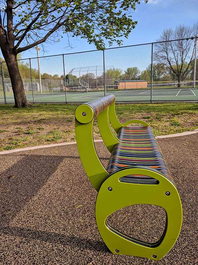 Even the benches get the thoughtful design treatment, offering comfort with a pop of color for weary parents.