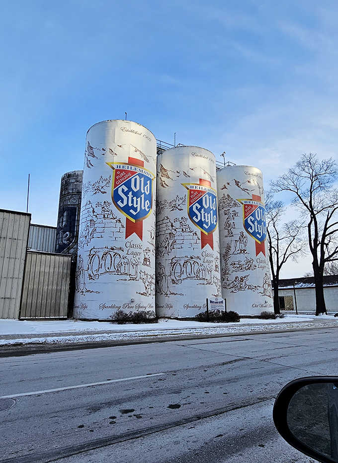 Fresh snow dusts the ground while these stalwart sentinels stand ready, proving Wisconsin winters can't dampen brewing spirits.
