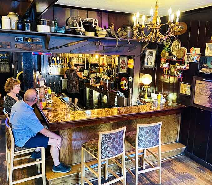 The bar gleams with character and charm, where locals and visitors alike gather to toast good times and great company.