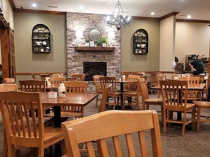That stone fireplace adds rustic charm, though let's be honest&mdash;you're here for what's on the buffet, not the decor.