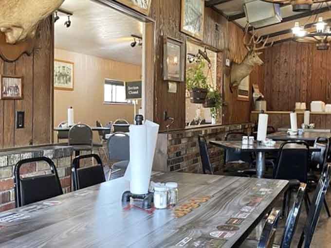 Rustic wood beams and mounted wildlife create that authentic Western atmosphere you can't fake or buy at IKEA.