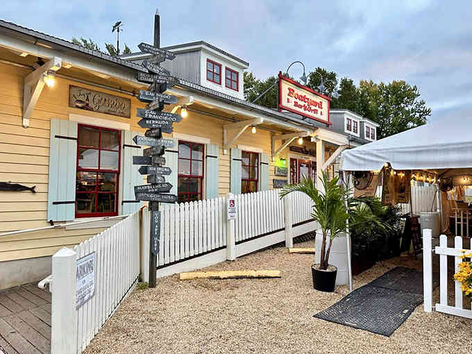 White picket fences and palm plants create a breezy coastal vibe where the crab cakes taste like a beach vacation.