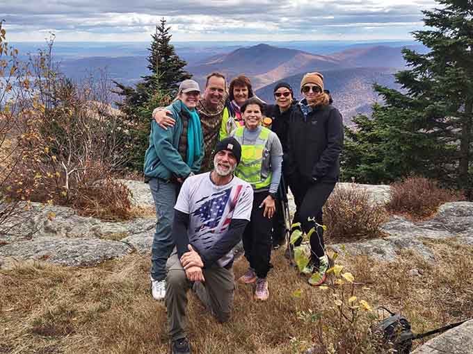 Summit selfies with friends who conquered the climb together&mdash;because shared suffering at altitude creates bonds that last forever.