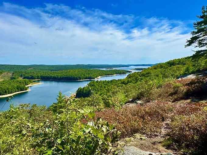 Blue water stretching to the horizon beneath wispy clouds &mdash; Quabbin Reservoir looks like the Scottish Highlands.
