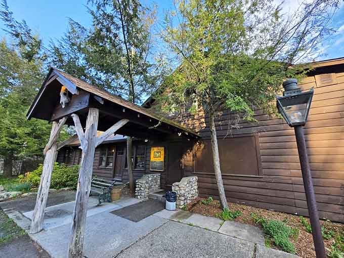 The rustic log entrance with weathered wood beams looks like it belongs in the Adirondacks, not rural New Jersey.