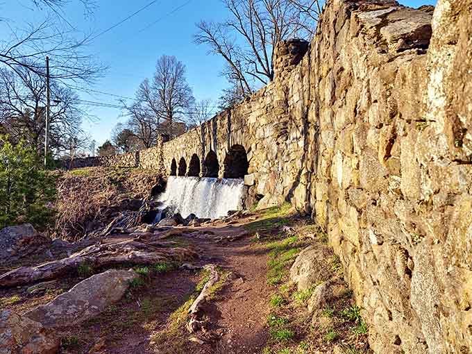 Five perfect stone arches frame sheets of falling water in this remarkable blend of human craftsmanship and nature.
