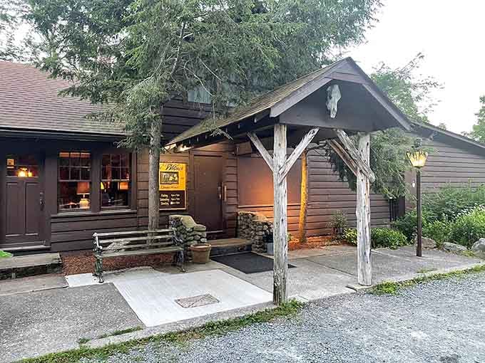 That warm glow spilling from the windows promises the kind of meal worth driving down every winding back road.