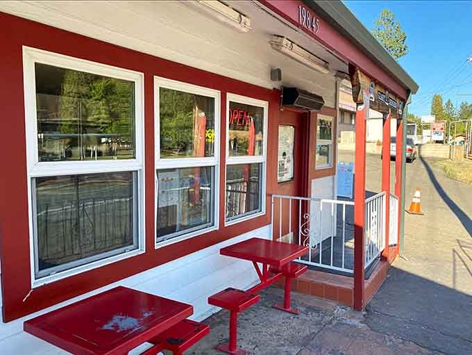 Red picnic tables under the California sun—outdoor dining doesn't need to be fancy to be absolutely perfect.