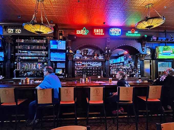 The bar glows with possibility, neon signs, and enough taps to keep any beer lover entertained.