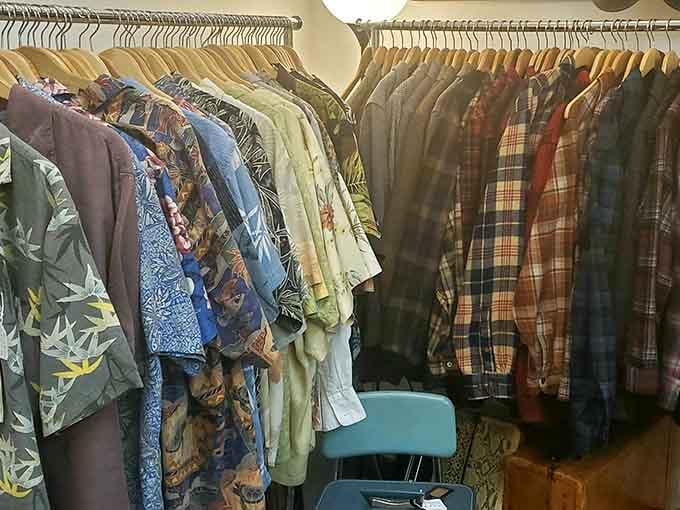 Racks of vintage clothing offer everything from Hawaiian shirts to plaid flannel, spanning decades of American fashion evolution.