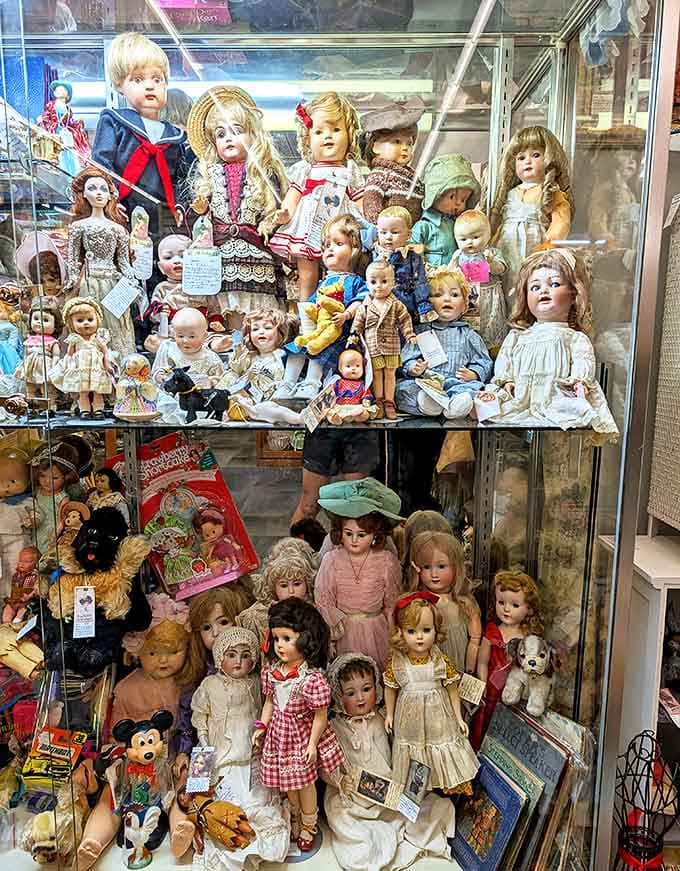A doll collection that's either charming nostalgia or the beginning of a horror movie, depending on perspective.
