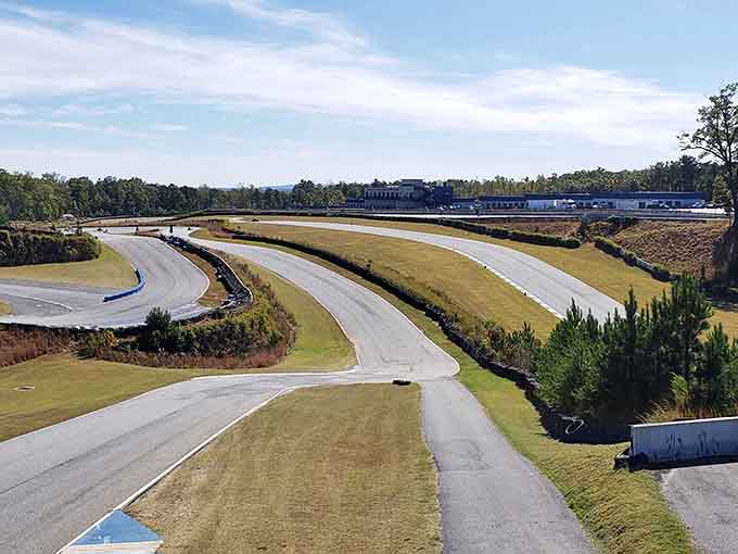 The track's flowing layout reveals itself from above, showcasing technical sections that separate the brave from the cautious drivers.