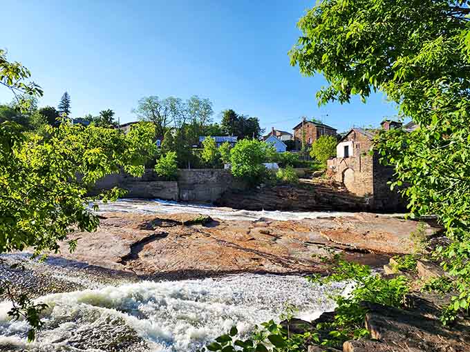 Historic buildings near the falls remind visitors that people have marveled at this natural wonder for generations.