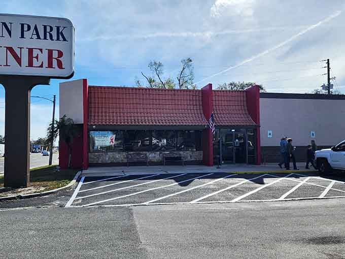 Red tile roof and classic diner styling promise hearty portions and coffee refills that keep coming without you having to ask.