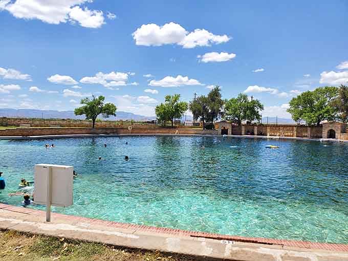 That perfect blue stretches out like a mirage that turned real, inviting swimmers into its constant 74-degree embrace.