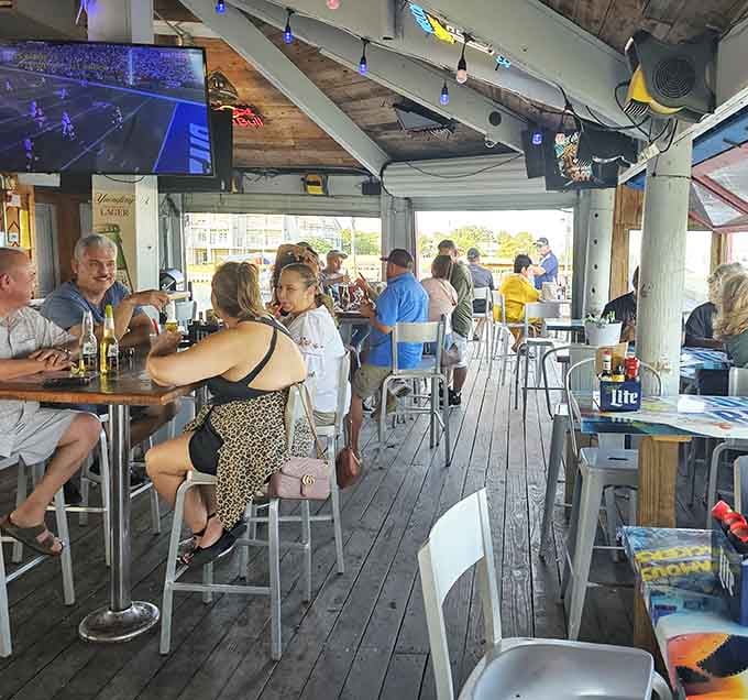 Happy people, cold drinks, and water views create the trifecta of perfect afternoon vibes you didn't know you needed.