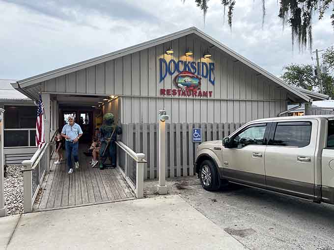 That weathered wooden ramp leading to fresh seafood promises the kind of authentic coastal dining experience you've been craving.