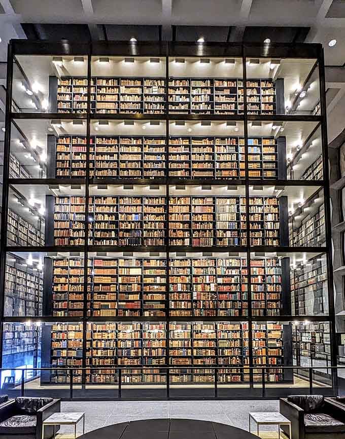 The book tower rises like a literary skyscraper, making your home bookshelf feel suddenly inadequate and slightly embarrassed.