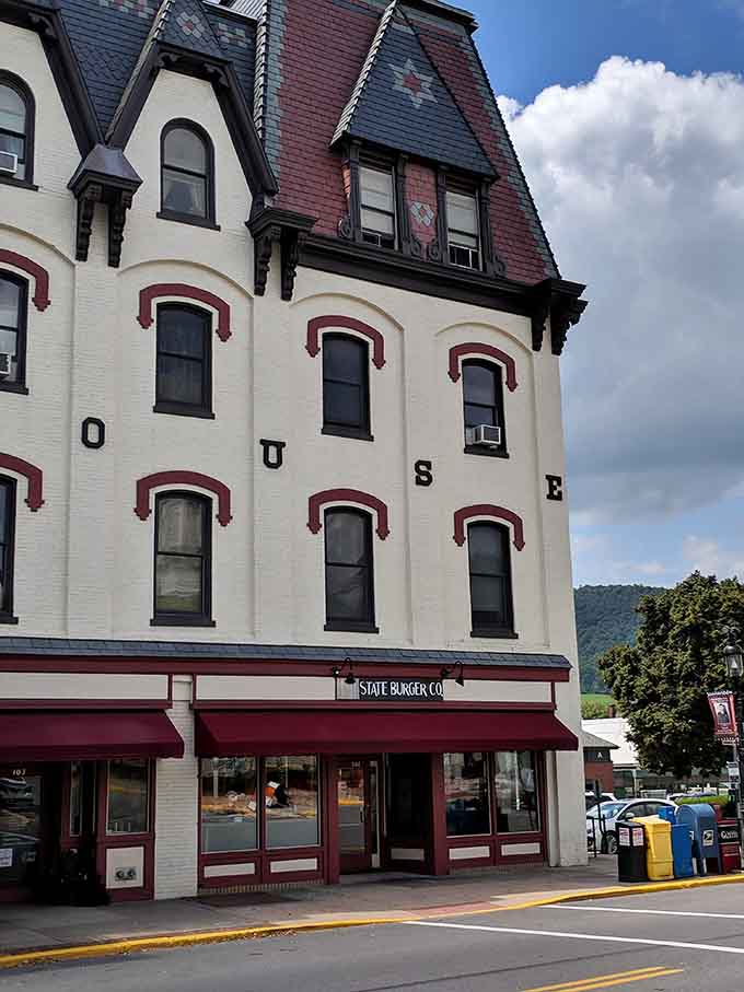 State Burger Co. occupies a building with "HOUSE" spelled vertically, because even the architecture here tells interesting stories.
