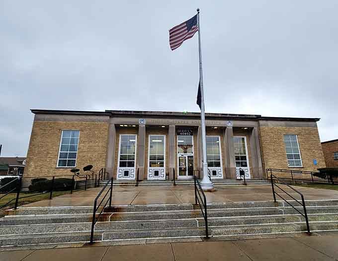 The post office stands proud with its classic columns, still delivering mail the old-fashioned way every single day.