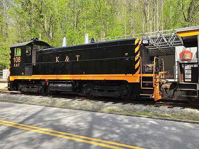 The K&T Railway engine in black and yellow stripes looks like it means business, and that business is mountain adventure.