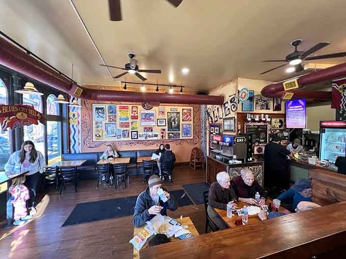 Cozy seating where strangers become friends over shared appreciation for exceptional sandwiches and good music.