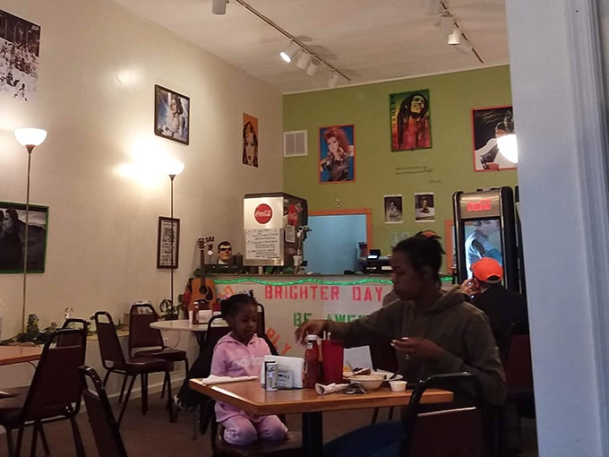 Families making memories over pancakes while surrounded by posters of music legends and movie icons.