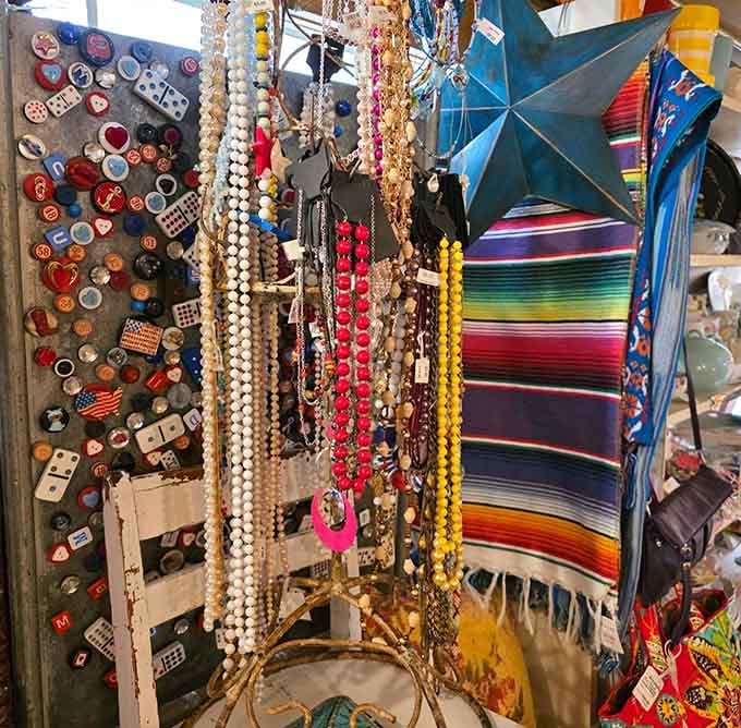 Colorful beaded necklaces dangle alongside vintage buttons, offering accessories that actually have some history behind them.