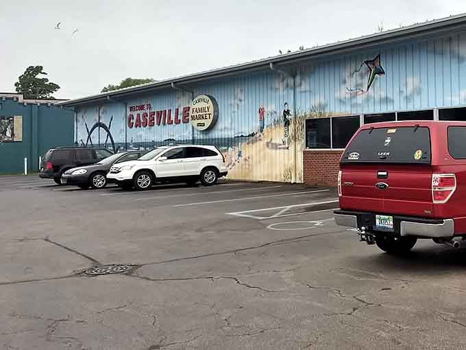 Caseville Family Market's mural celebrates local life with artistic flair, proving grocery shopping doesn't have to be boring anywhere.