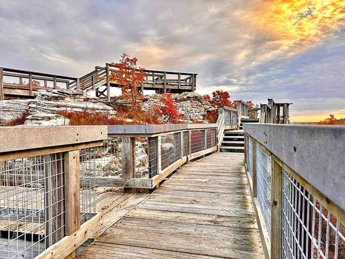 Multi-level boardwalks climbing toward sunset skies, offering perspectives that change with every step you take upward.