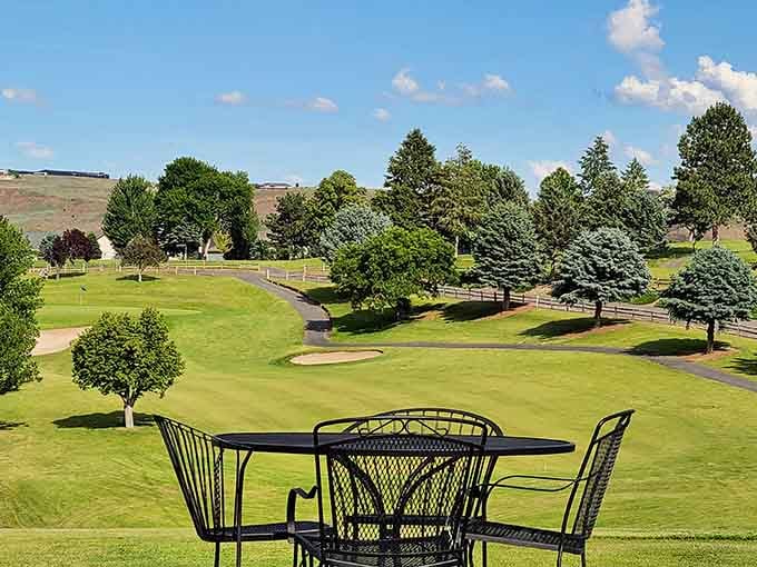 Manicured greens with mountain views, where par feels less important than simply being outside on days like this.