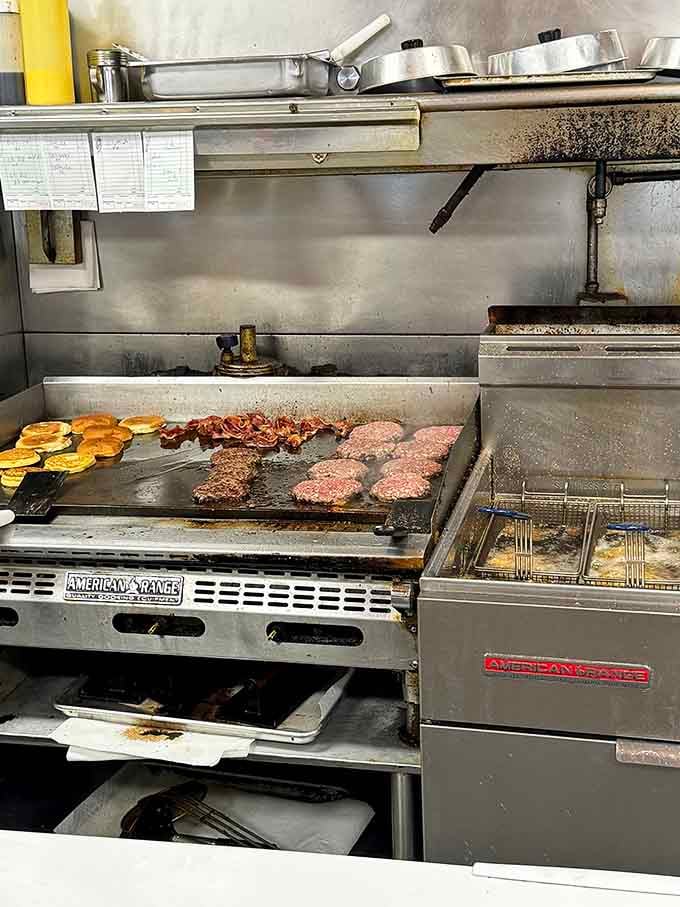 The griddle's loaded with breakfast dreams in progress, and your order's cooking up right there before your eyes.