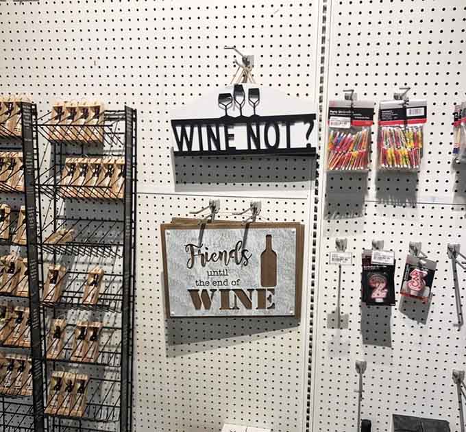 Wine-themed wall decor reminds you that "Friends until the end of wine" is basically the Pennsylvania state motto anyway.