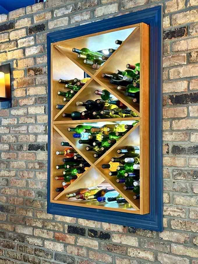 A diamond-pattern wine rack built into exposed brick adds just the right touch of sophistication to this neighborhood gem.