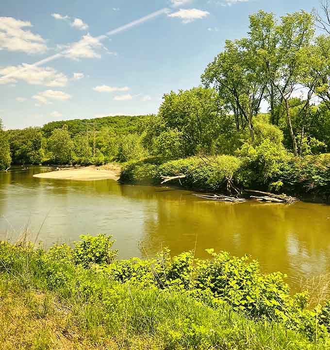 The Cuyahoga River meanders through golden-green landscapes, looking nothing like its troubled past would suggest.