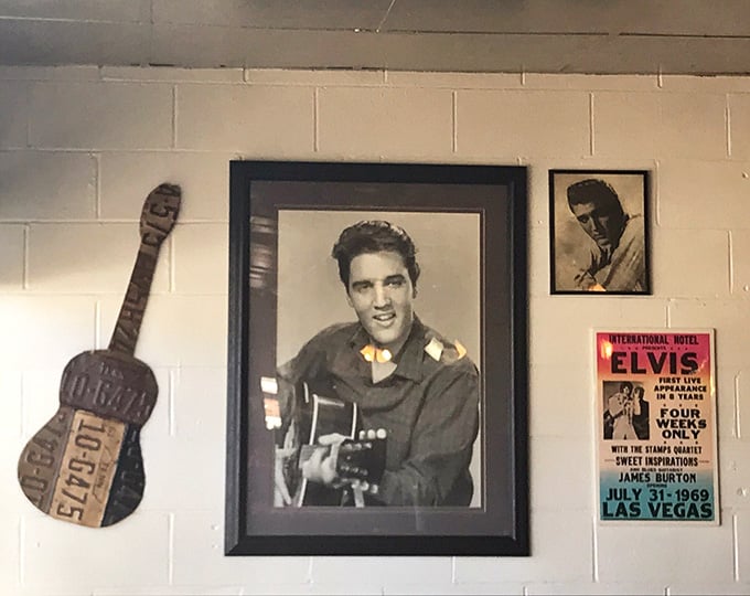 The King watches over this dining room, making sure everyone gets their fill of good food and good times.