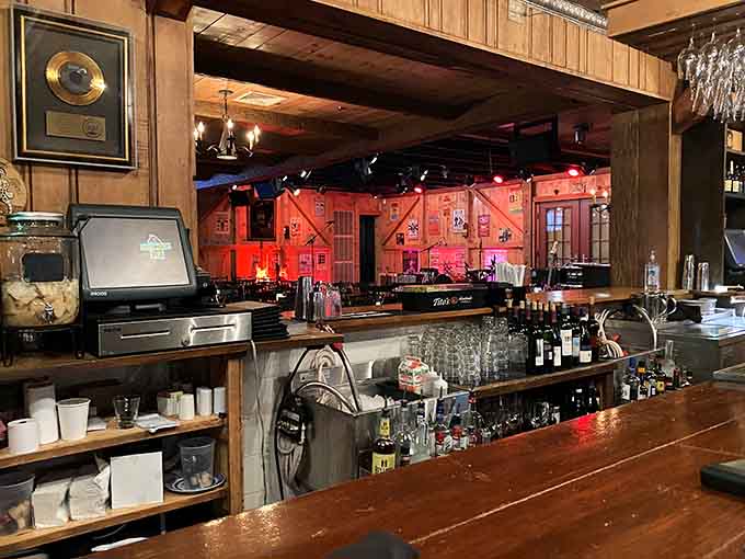 The bar glows with stage lights reflecting off bottles, creating ambiance that makes every drink taste better somehow.