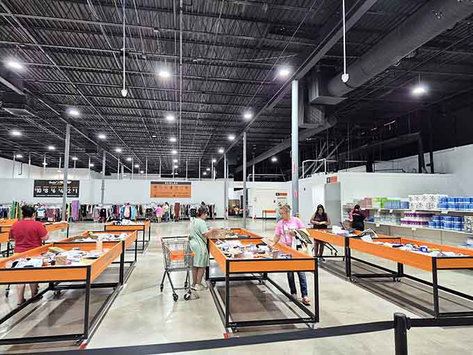 Shoppers navigating the warehouse with the determination of Black Friday veterans on a Tuesday afternoon treasure hunt.