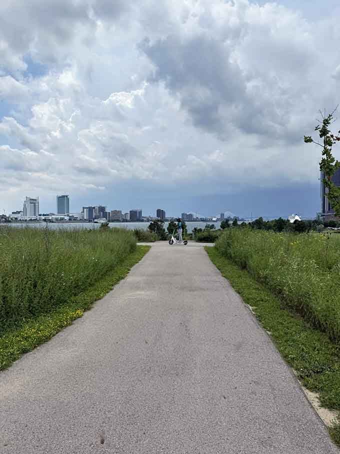 Even scooters get to enjoy this waterfront paradise where modern transportation meets timeless river views perfectly.