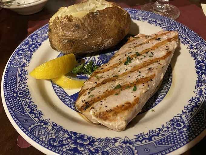 Grilled mahi-mahi with lemon wedges proves fish can be simple, elegant, and absolutely satisfying simultaneously.