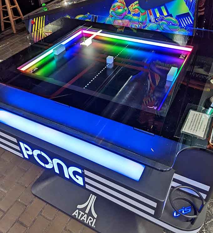 Atari Pong on a cocktail table, where the simplest game ever made still delivers surprisingly addictive competitive entertainment today.