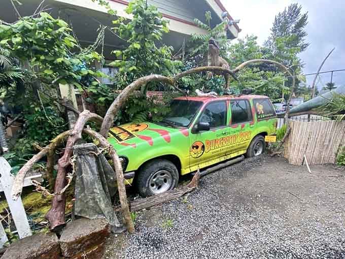 Only at Eastside Big Tom would a Jurassic Park-themed SUV feel completely at home in the parking lot.